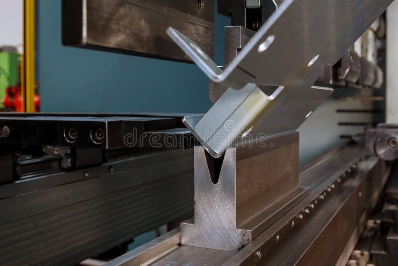 Bending Sheet Metal with a Hydraulic Machine at the Factory Stock Photo ...