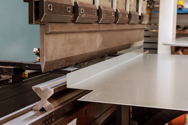Bending Sheet Metal with a Hydraulic Machine at the Factory Stock Image ...
