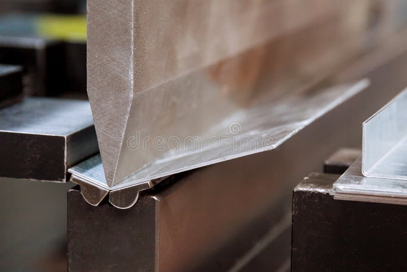 Bending Sheet Metal with a Hydraulic Machine at the Factory Stock Image ...