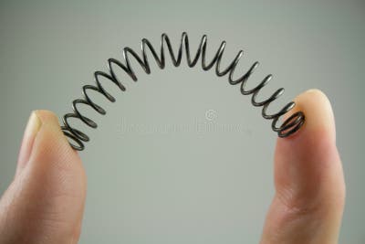Bending Spring with Fingers Stock Image - Image of compressed, spring ...
