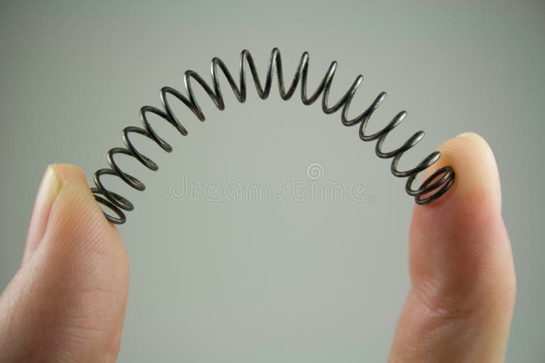 Bending Spring with Fingers Stock Image - Image of compressed, spring ...