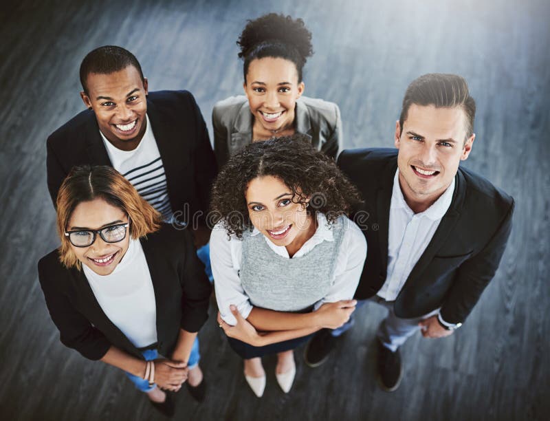 The Benefits of Teamwork are Far Reaching. High Angle Shot of a Group ...
