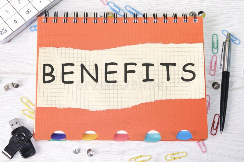 BENEFITS Word is Written on a Sheet in a Cage Lying on a Notebook on ...