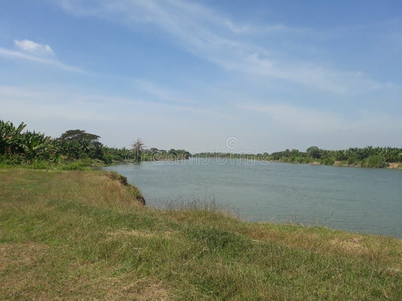 Bengawan Solo Riverside stock photo. Image of hill, river - 252833336