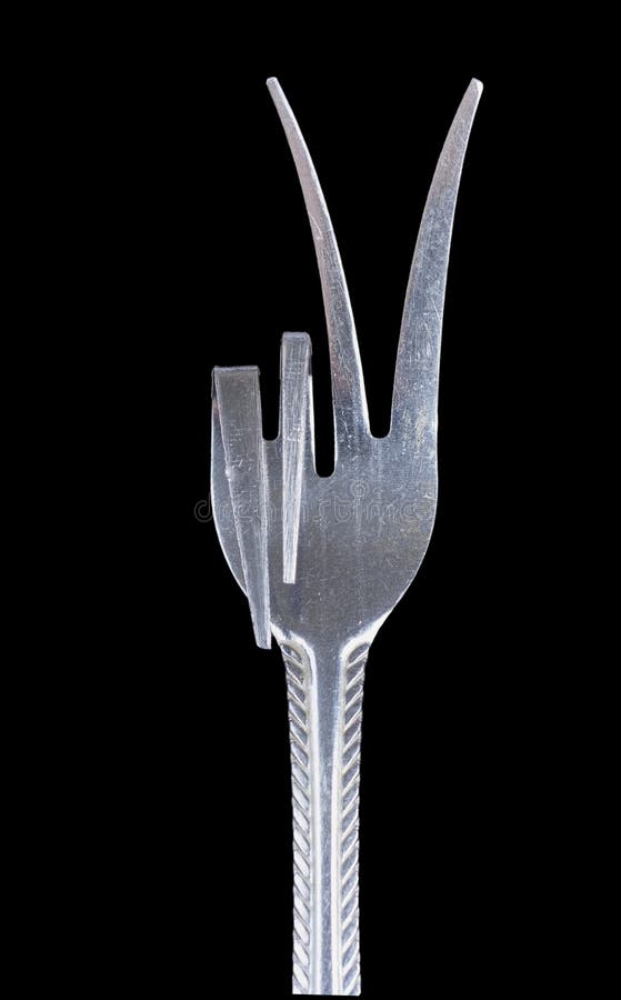 Bent metal fork, Victory. stock image. Image of dining - 33068193