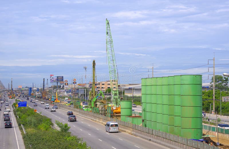 Bentonite Storage Silos with Many Construction Heavy Machinery Working ...