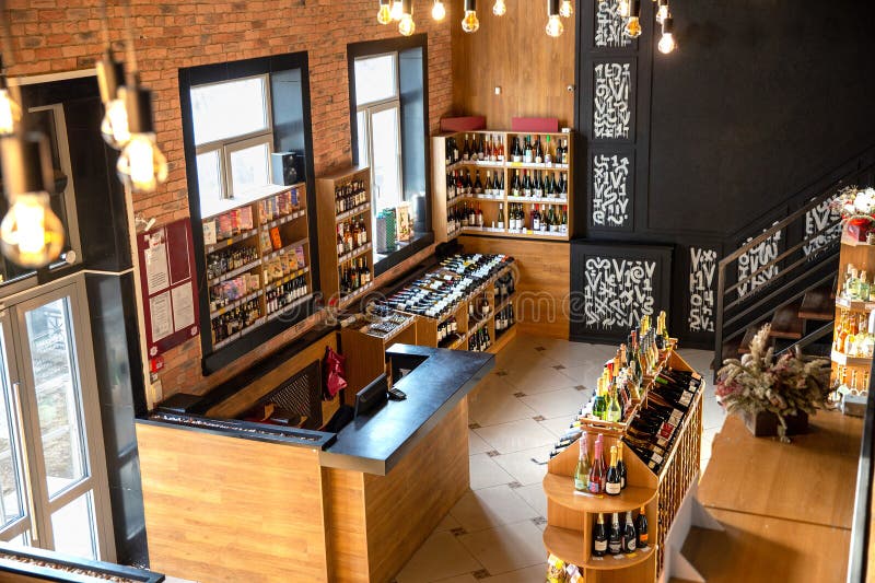 Bottles Withe Alcohol on Store Shelves. Interior of an Alcoholic Shop ...