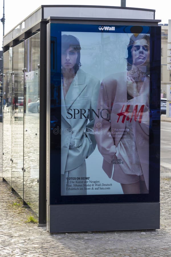 Berlin, Germany - April 11, 2025: a Bus Stop Featuring a Vibrant Spring ...