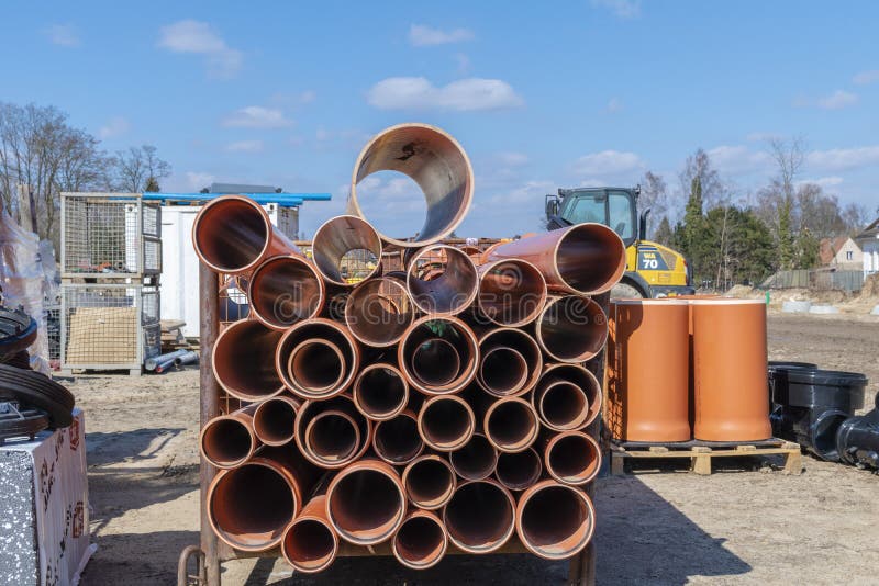 Looking To Plastic Pipes on a Construction Site with Material ...