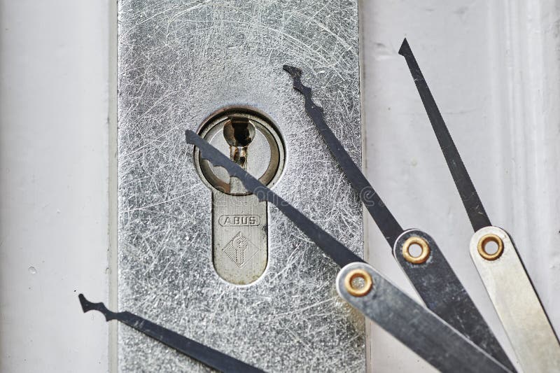 Photo of Lockpicks in Front of a Closed Door Editorial Photography ...