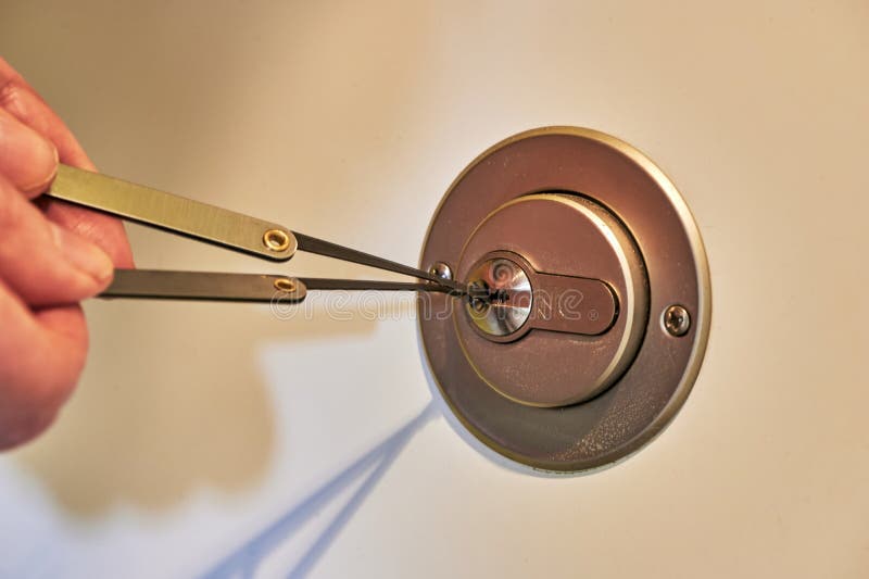 Photo of Lockpicks in Front of a Closed Door Editorial Photography ...