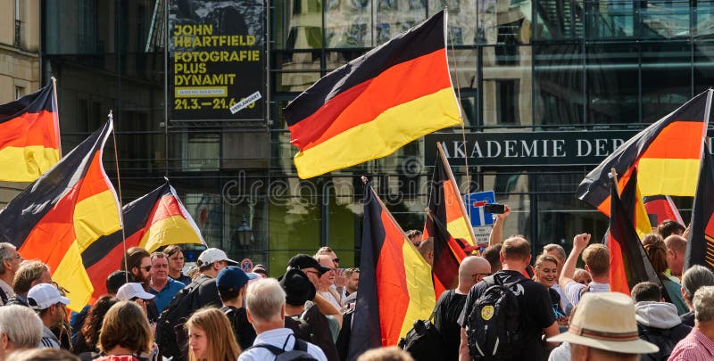Demonstrators Wave the Black-red-gold Flag of Germany during a ...