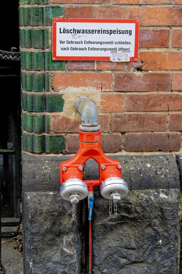Fire Hydrant with Hose Connection for the Fire Brigade on a Building ...