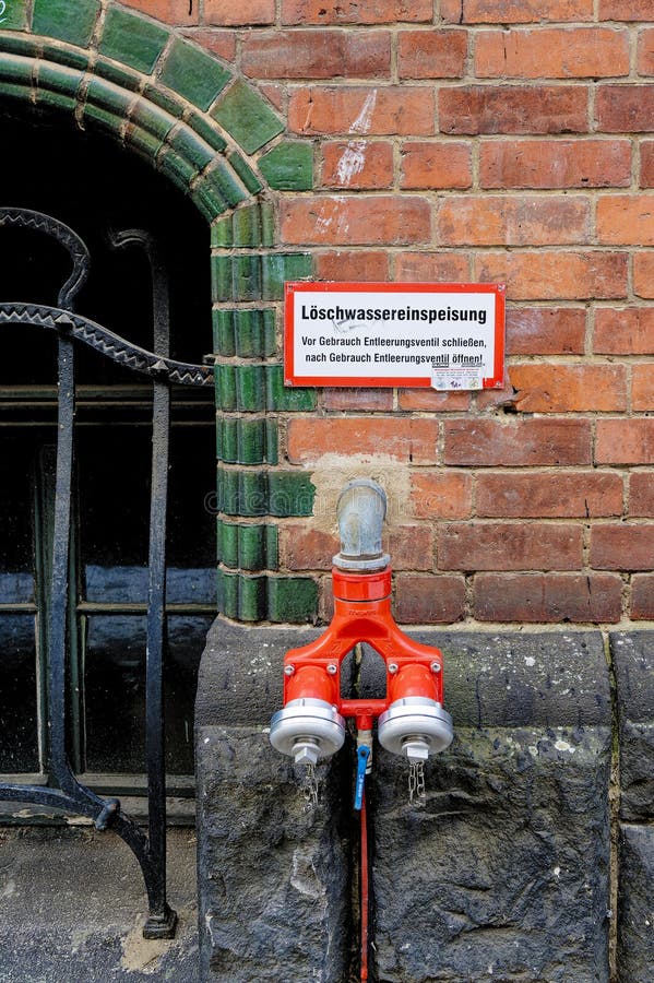 Fire Hydrant with Hose Connection for the Fire Brigade on a Building ...