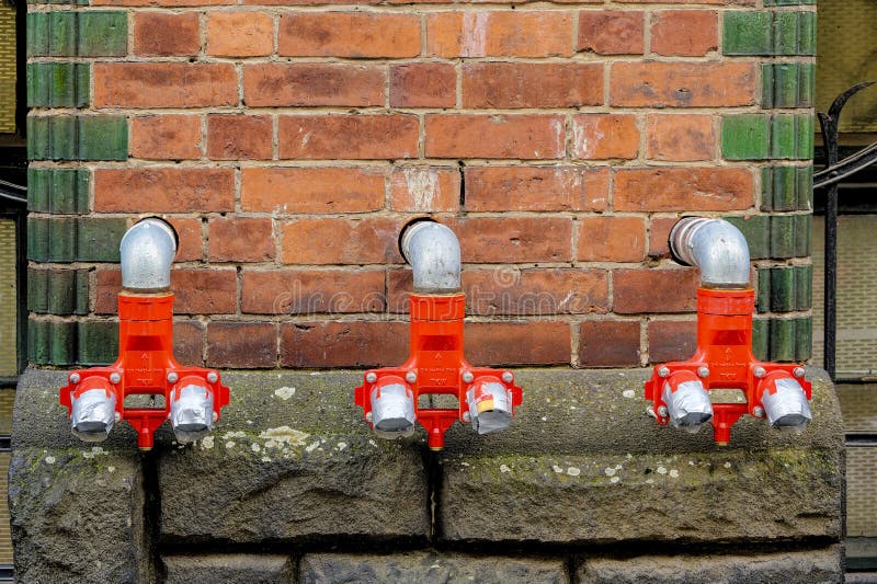 Fire Hydrant with Hose Connection for the Fire Brigade on a Building ...