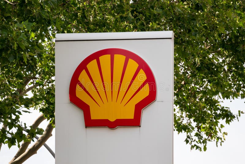 Shell Logo in Front of a Tree Editorial Stock Image - Image of leaf ...