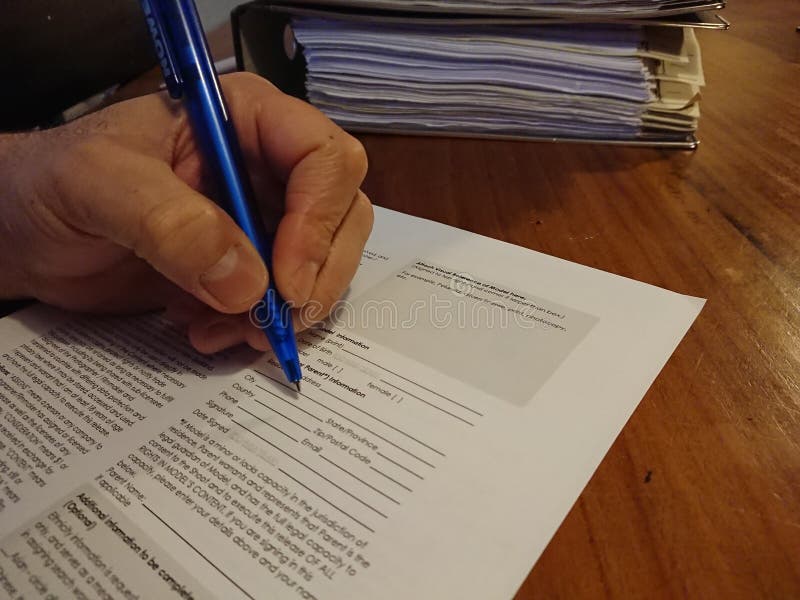 Signing a Model Release Form Editorial Stock Image - Image of ...