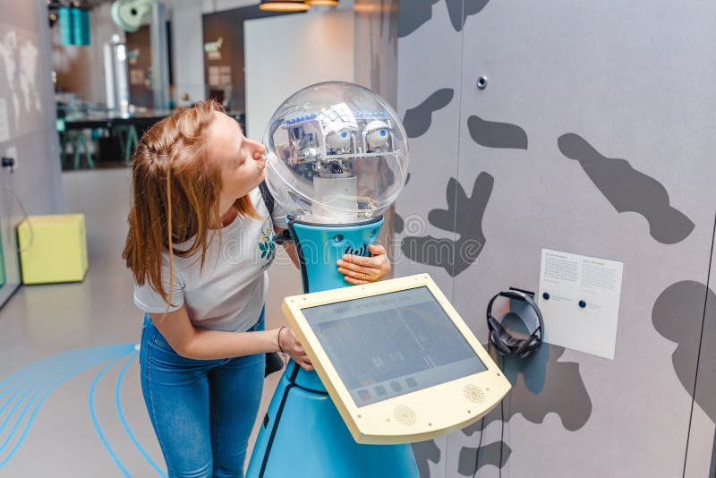 Visitors Interact with Robot Assistant Guide in Exhibition of Internet ...