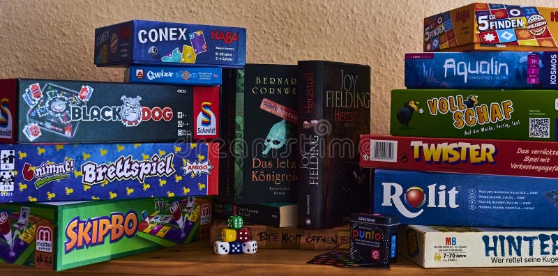 Books and Many Different Packs of Board Games Editorial Photography ...