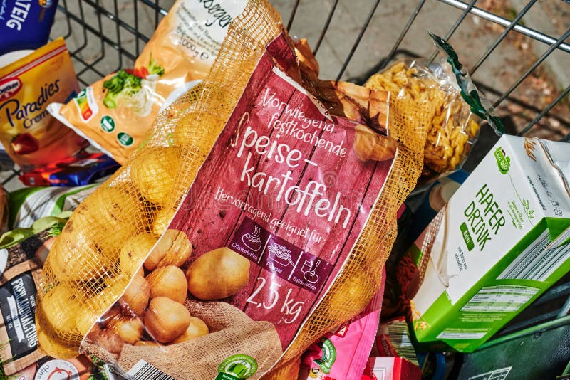 Shopping Cart with Various Products for daily Needs Editorial Photo ...