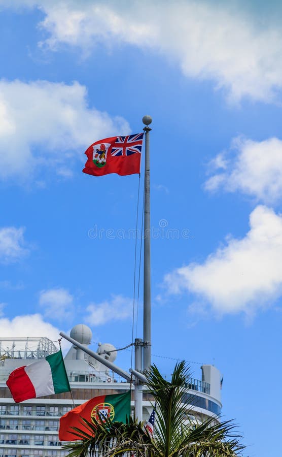 Bermuda Flag Over Cruise Ship Stock Photo - Image of cruise, clouds ...
