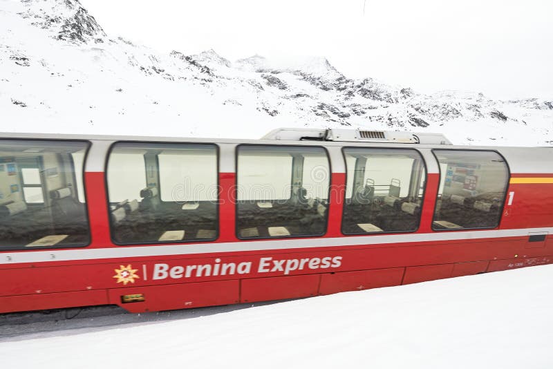 Red Train Bernina Express To the Passage in the Mountains. Stock Image ...