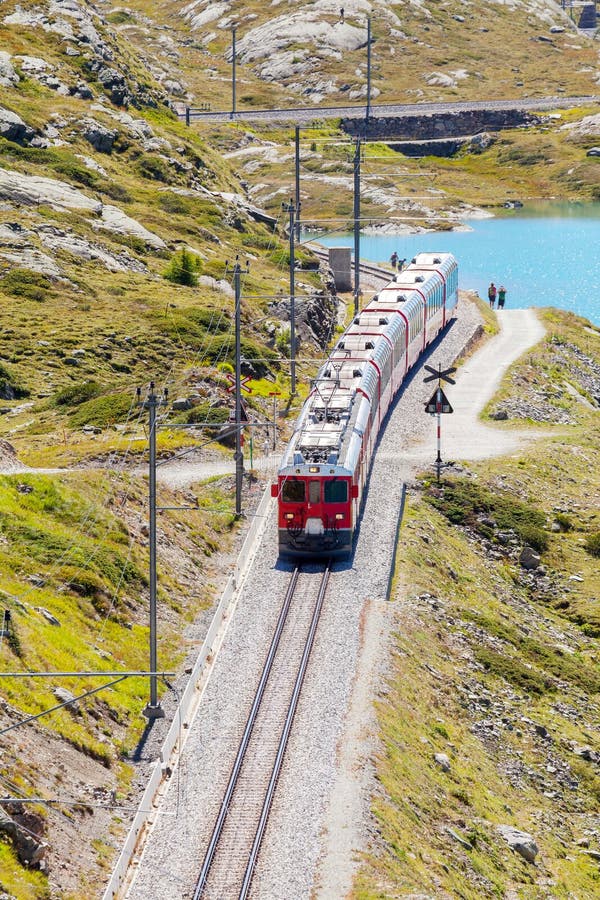 Bernina red train CH stock photo. Image of passengers - 176480800