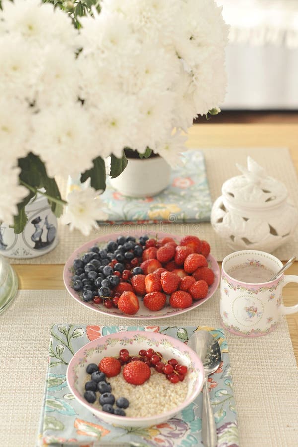 Berries for Breakfast. a Decorated Table with Flowers. Stock Image ...