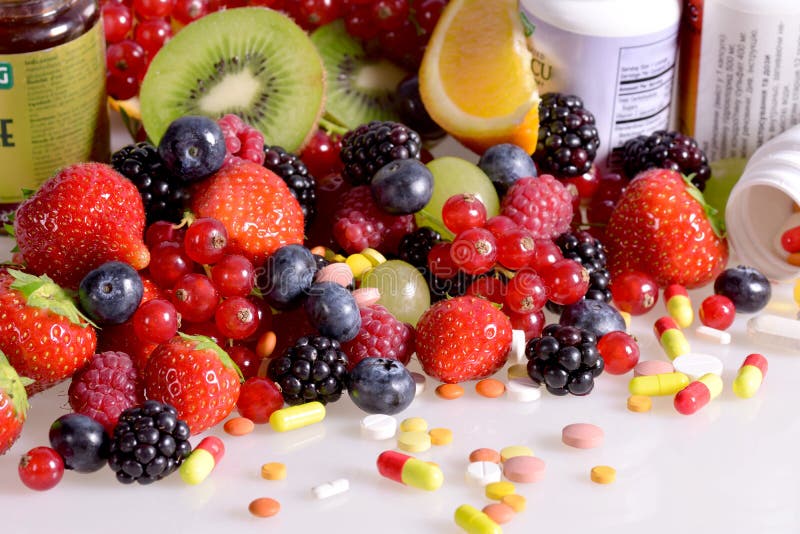 Berries, Fruits, Vitamins and Nutritional Supplements Stock Image ...