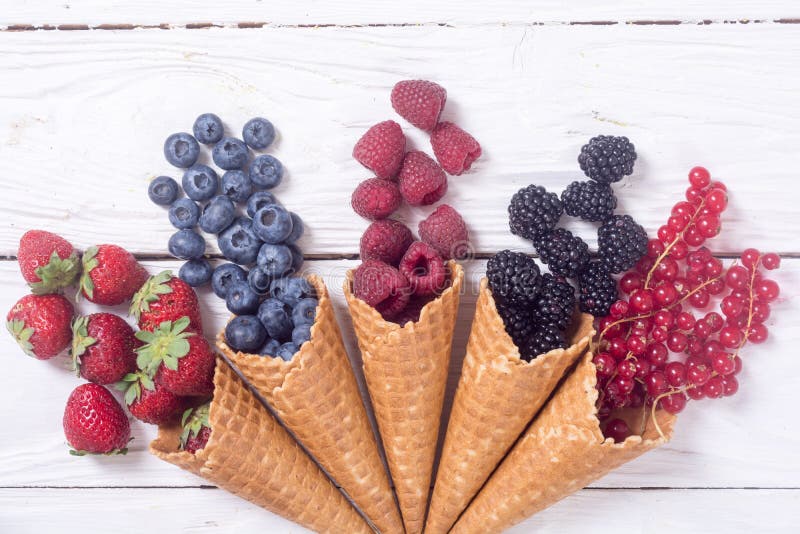Berries in ice cream cone stock photo. Image of pattern - 97644222