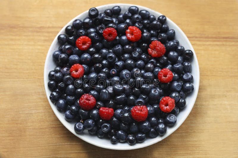 The berries on the plate stock image. Image of berries - 93012175