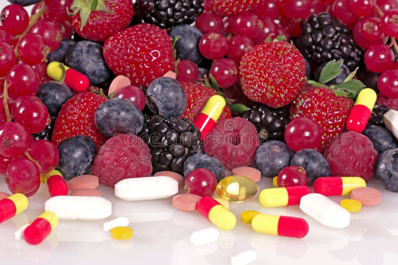 Berries, Vitamins and Nutritional Supplements Stock Image - Image of ...