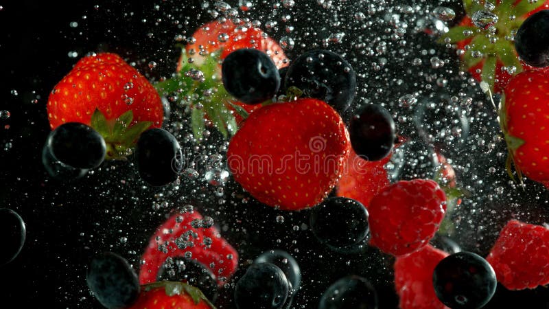 Berry Fruit Pieces Falling Down and Splashing Underwater Stock Image ...