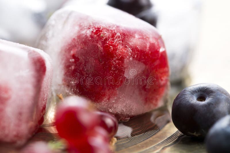 Berry Fruits Frozen in Ice Cubes Stock Image - Image of gourmet ...