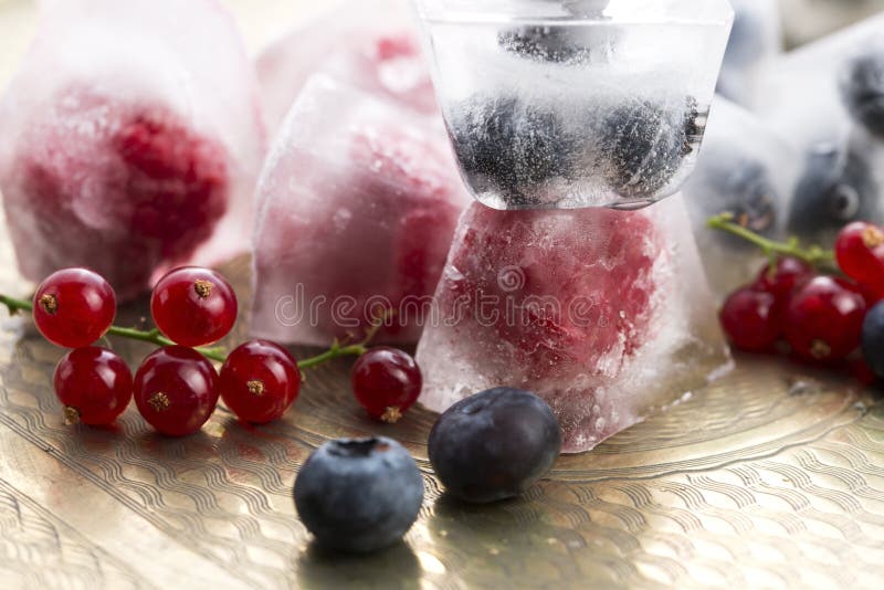 Berry Fruits Frozen in Ice Cubes Stock Photo - Image of fresh, fruit ...