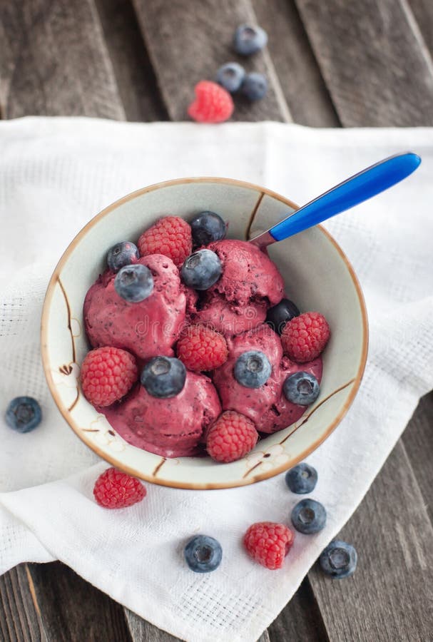 Berry Ice Cream Decorated with Fresh Blueberries and Raspberries Stock ...