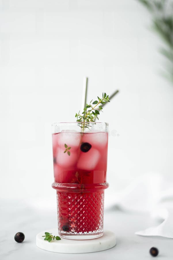 Berry Juice from Blackcurrant and Cranberries with Ice in a Glass Stock ...