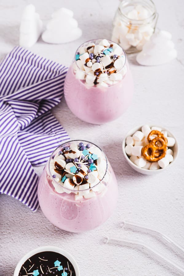 Berry Milkshake with Marshmallows, Chocolate and Sprinkles in Glasses ...