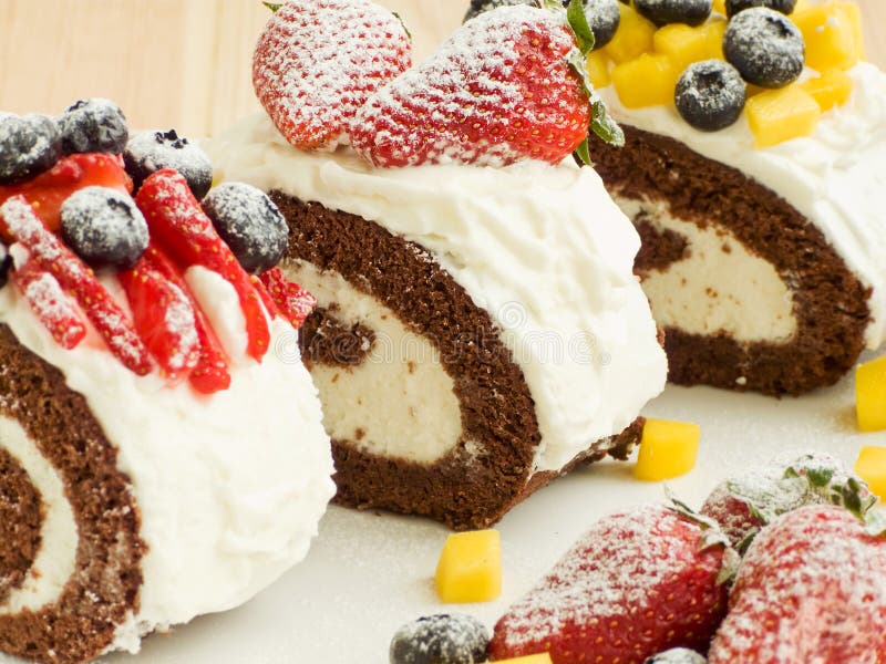 Berry roulades stock photo. Image of fruit, mango, portion - 19544340