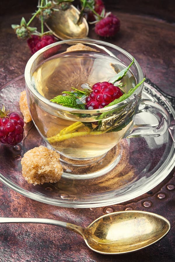 Berry tea with raspberries stock image. Image of beverage - 95731447