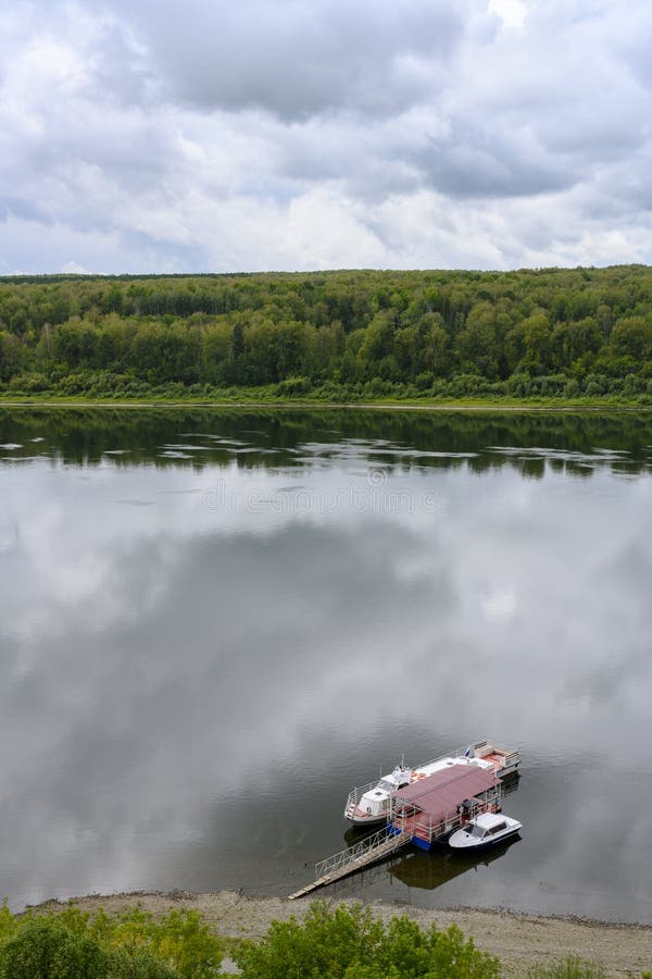 Berth with Tourist Ships Under a Stormy Sky on the Tom River in Siberia ...