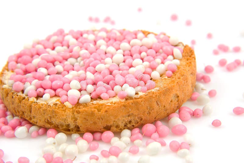Beschuit met roze muisjes stock afbeelding. Image of moederschap - 11568573
