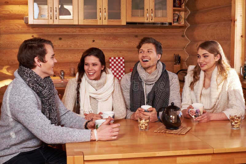 Best Friends Drinking Hot Tea in Cosy Kitchen at Winter Cottage Stock ...