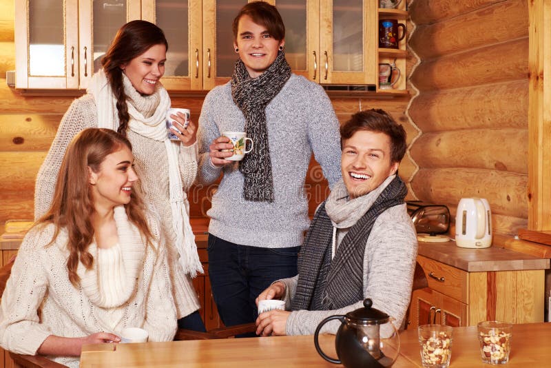 Best Friends Drinking Hot Tea in Cosy Kitchen at Winter Cottage. Stock ...