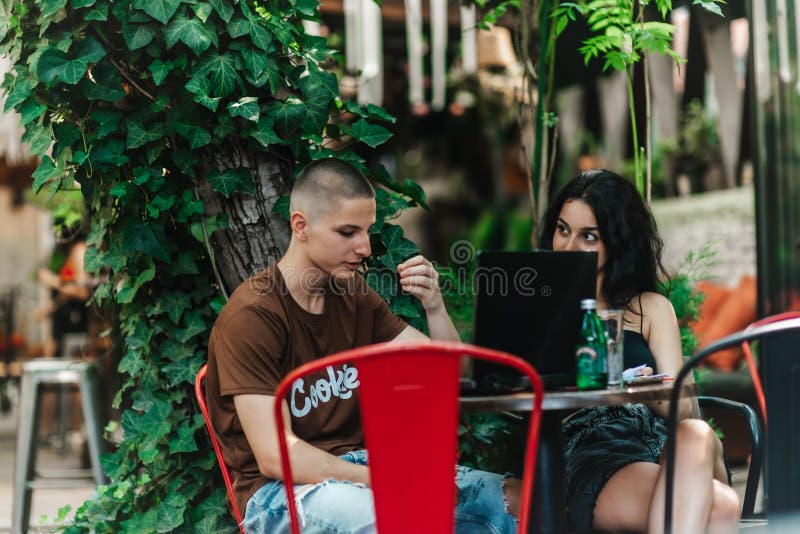 High School Students Studying and Researching after Classes in a Cafe ...