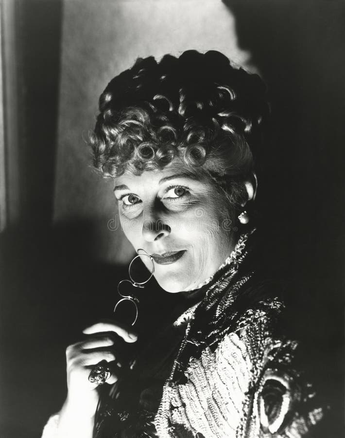 Woman Holding Lorgnette Stock Photos - Free & Royalty-Free Stock Photos ...