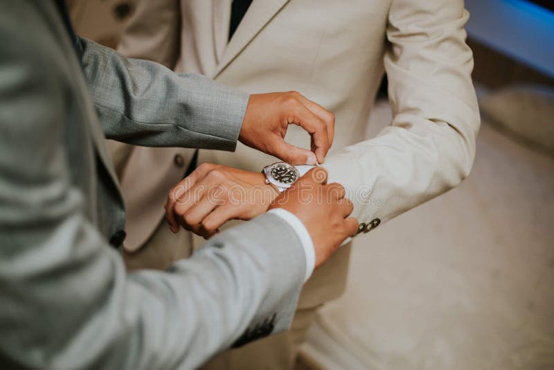 Best Man Fixing the Sleeve of the Groom Stock Image - Image of person ...