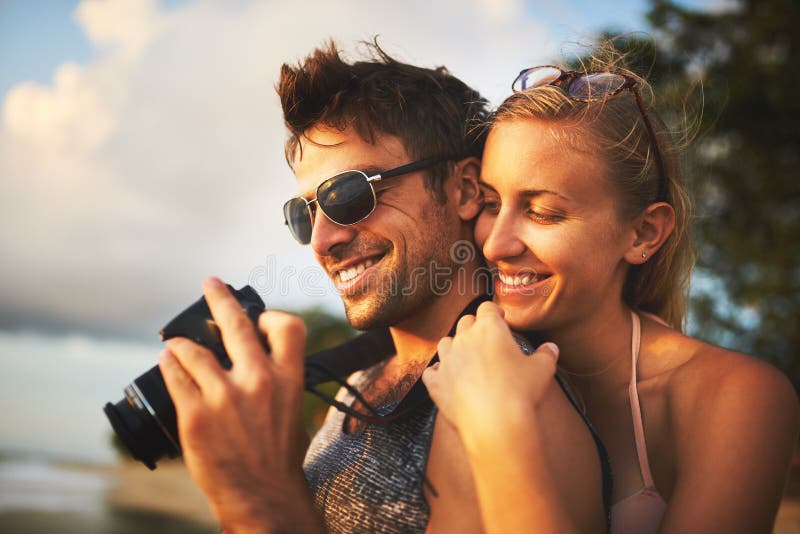 The Best Memories Are Made At The Beach A Young Couple Spending The