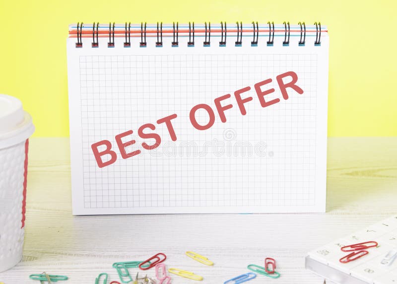 Best Offer Text on a Notebook Standing on a Table on a Yellow ...