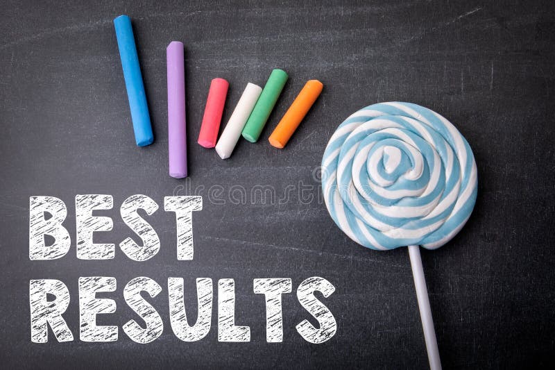Best Results. Text and Colored Pieces of Chalk on a Dark Chalkboard ...